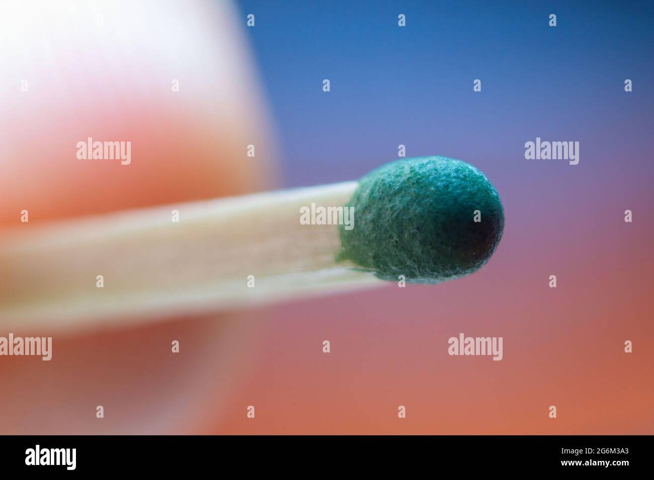 Macro photo of a matchstick with green sulphur Stock Photo - Alamy