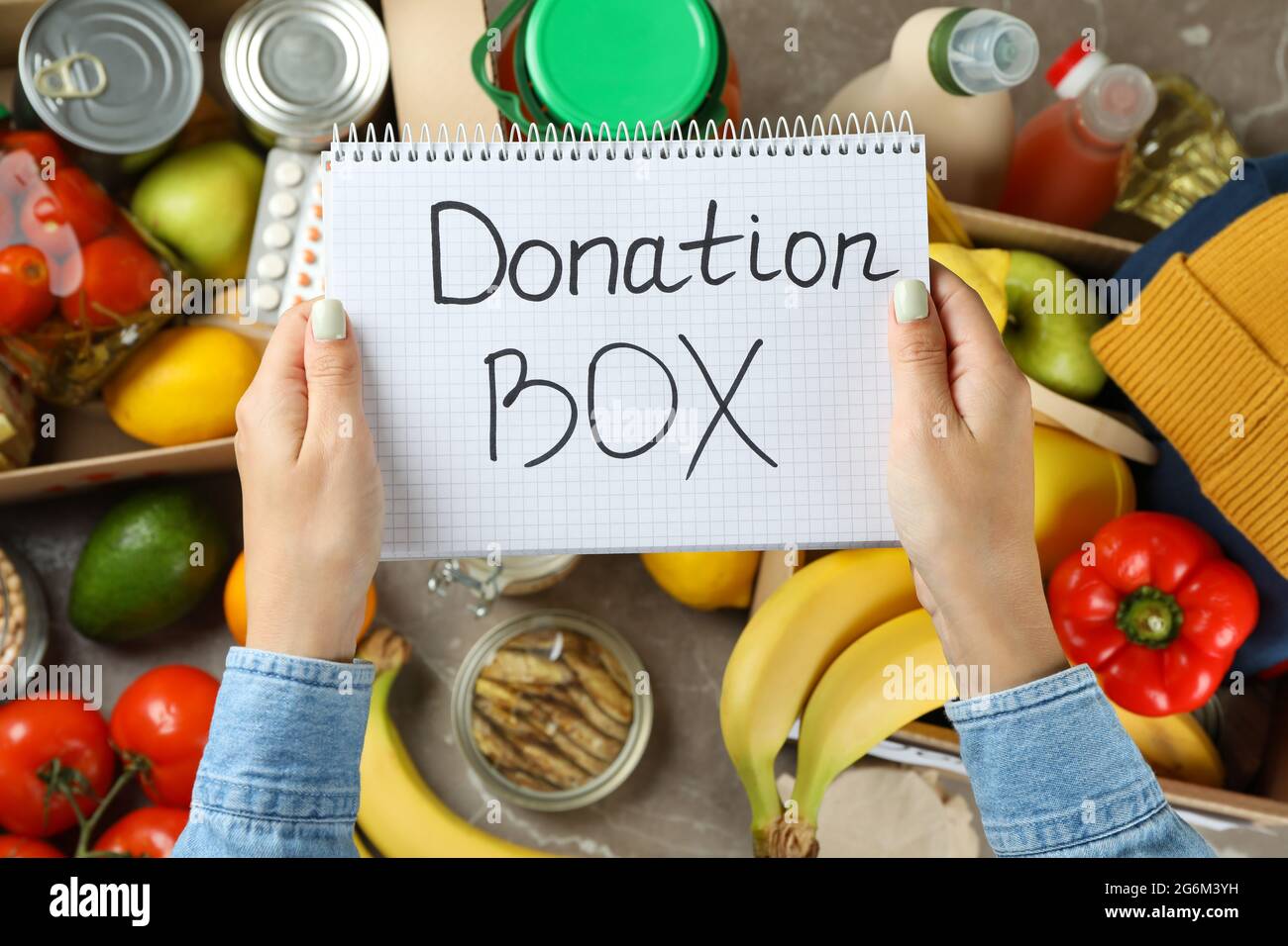 Charity giving food hands hi-res stock photography and images - Alamy