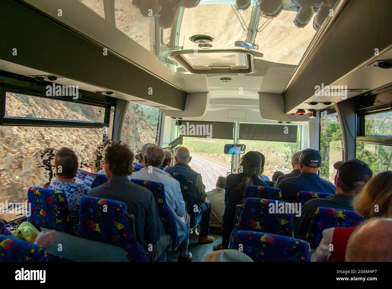 Omnibus interior showing passengers Stock Photo - Alamy