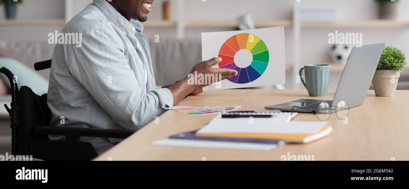 Creative male in workplace. Designer working with color palette at ...