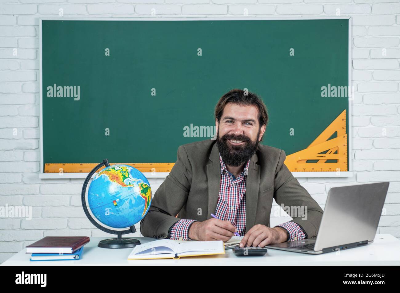man with beard and moustache look as businessman or teacher in college ...