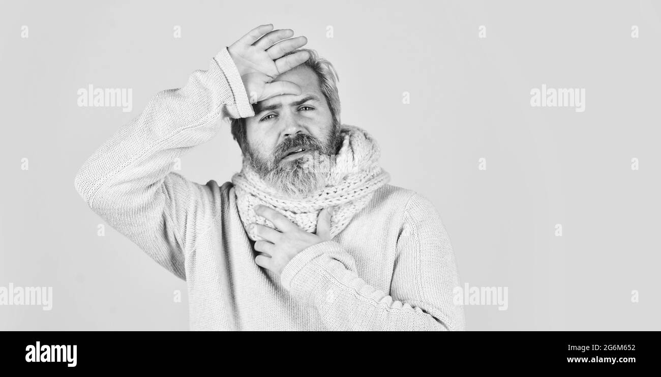 Immune response. Bearded man sick. Warm scarf around neck. Cold flu ...