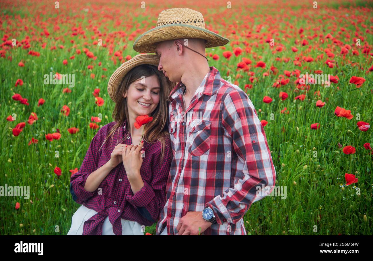 being together. lovers in flower field. couple in love. man and woman ...