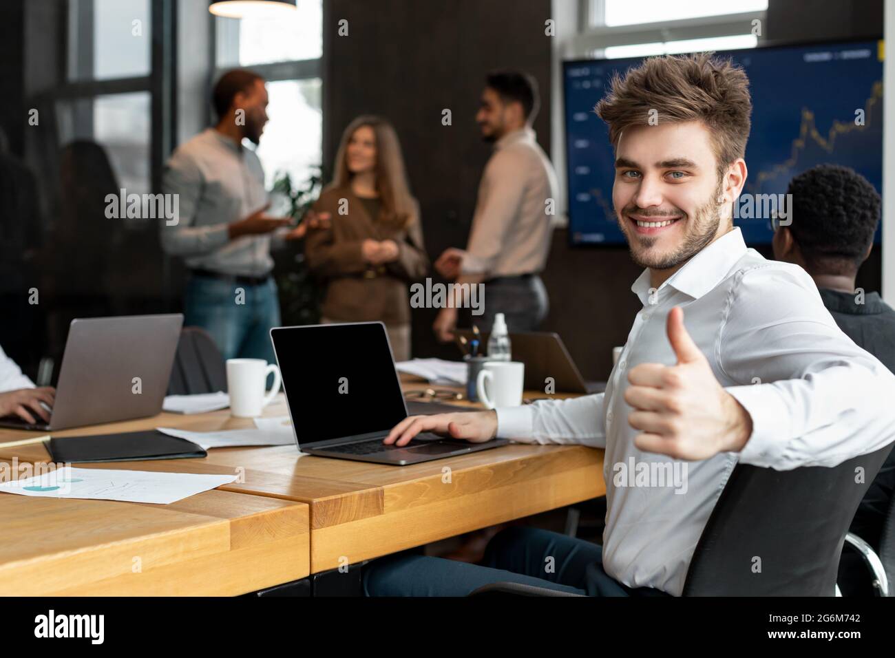 Group thumbs up employee hi-res stock photography and images - Alamy
