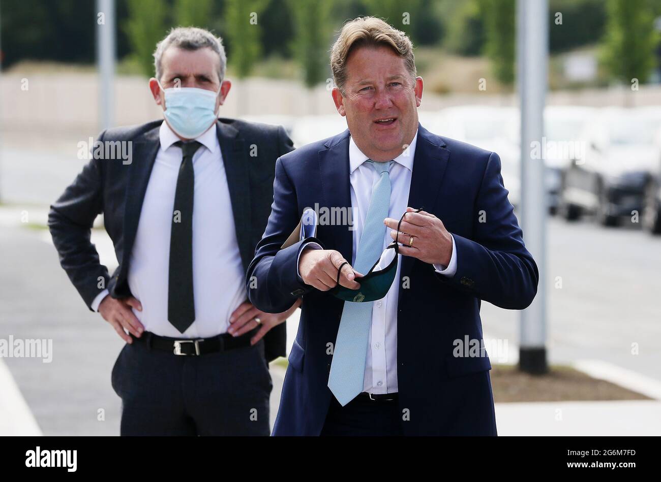 Minister for Housing Darragh OÕBrien (right) arrives for the launch of ...