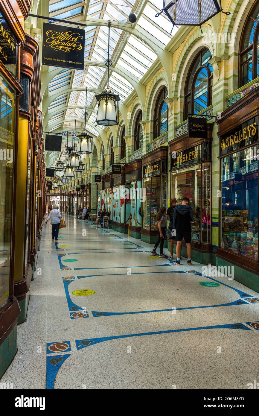 The light and airy glass and timber arched roof of the Royal Arcade ...
