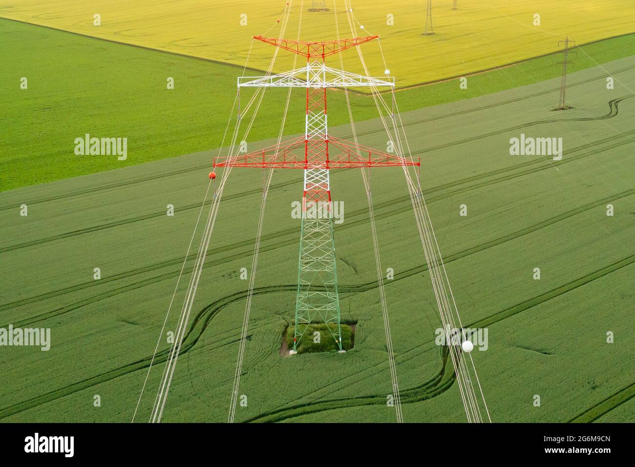 Aerial view of electric power transmission lines at sunset Stock Photo ...