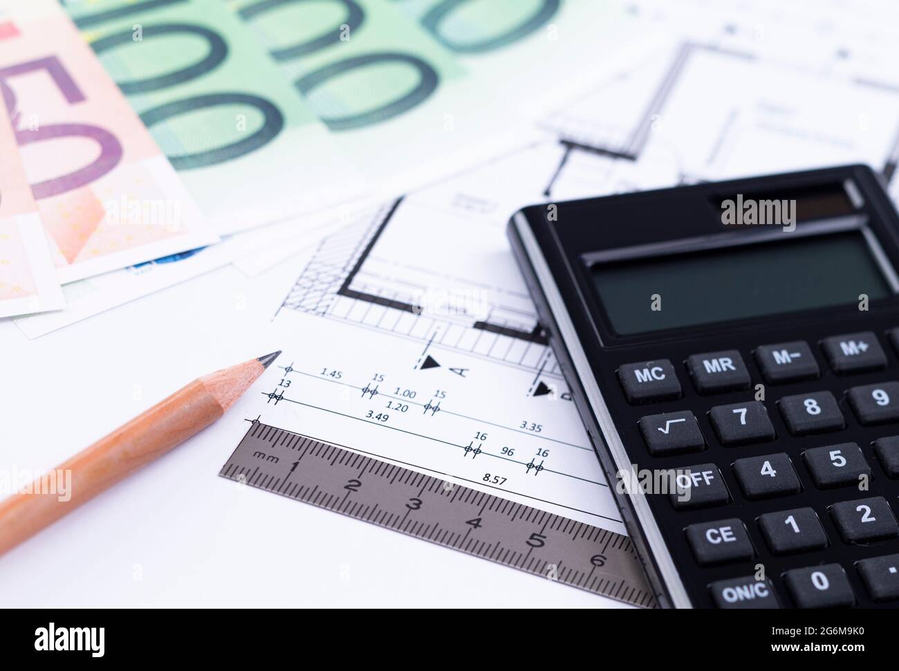 The photo shows an Exposé with pencil, money and steel ruler Stock ...