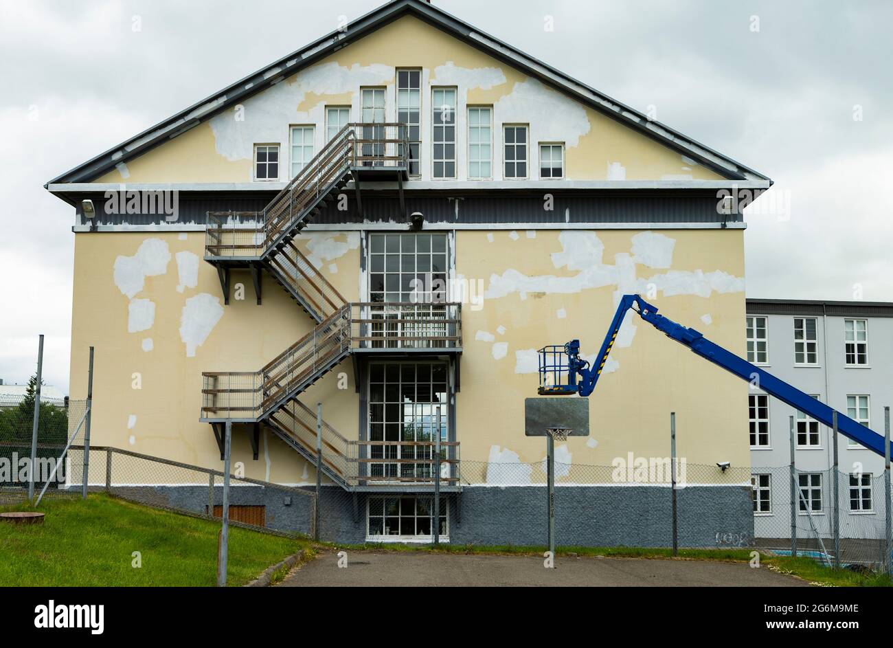 The photo shows a school building that receives a renovation Stock ...