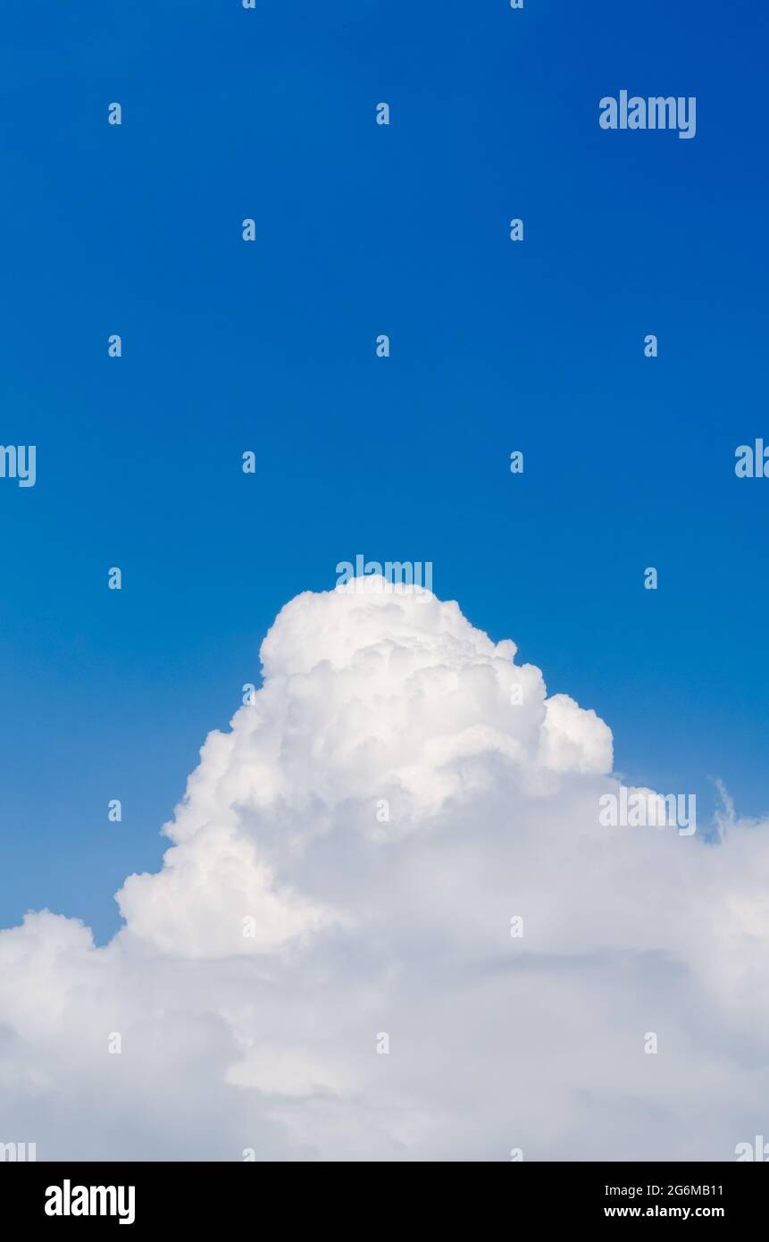 Massive clouds in the clear blue sky after a rain storm, natural ...