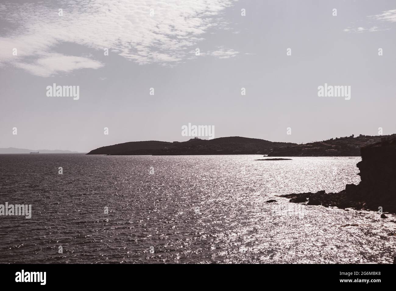 Rocky, wild cliffs, contrast colorless sea shore line landscape near ...