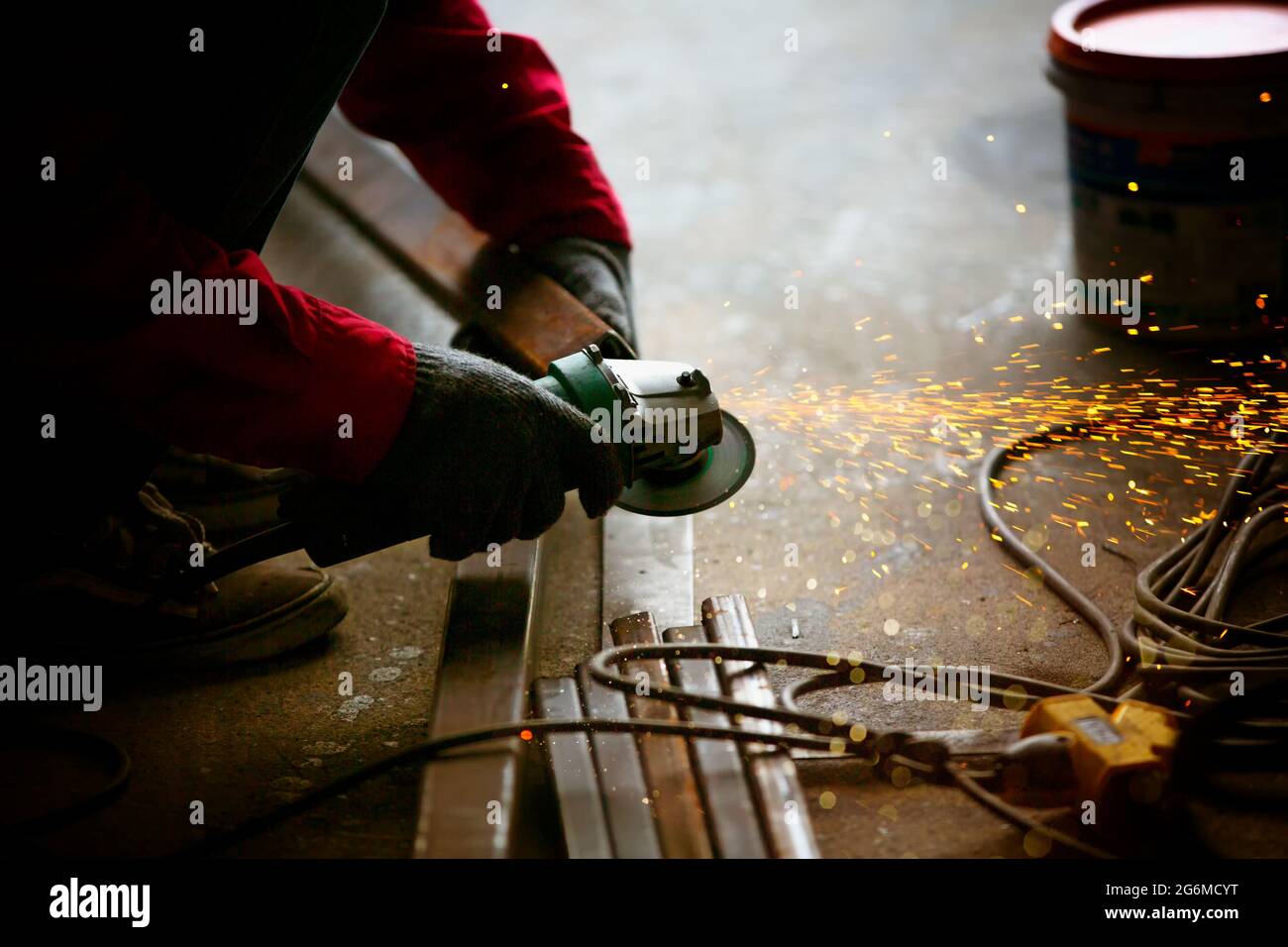 Welder used grinding stone on steel in factory with sparks, Welding ...