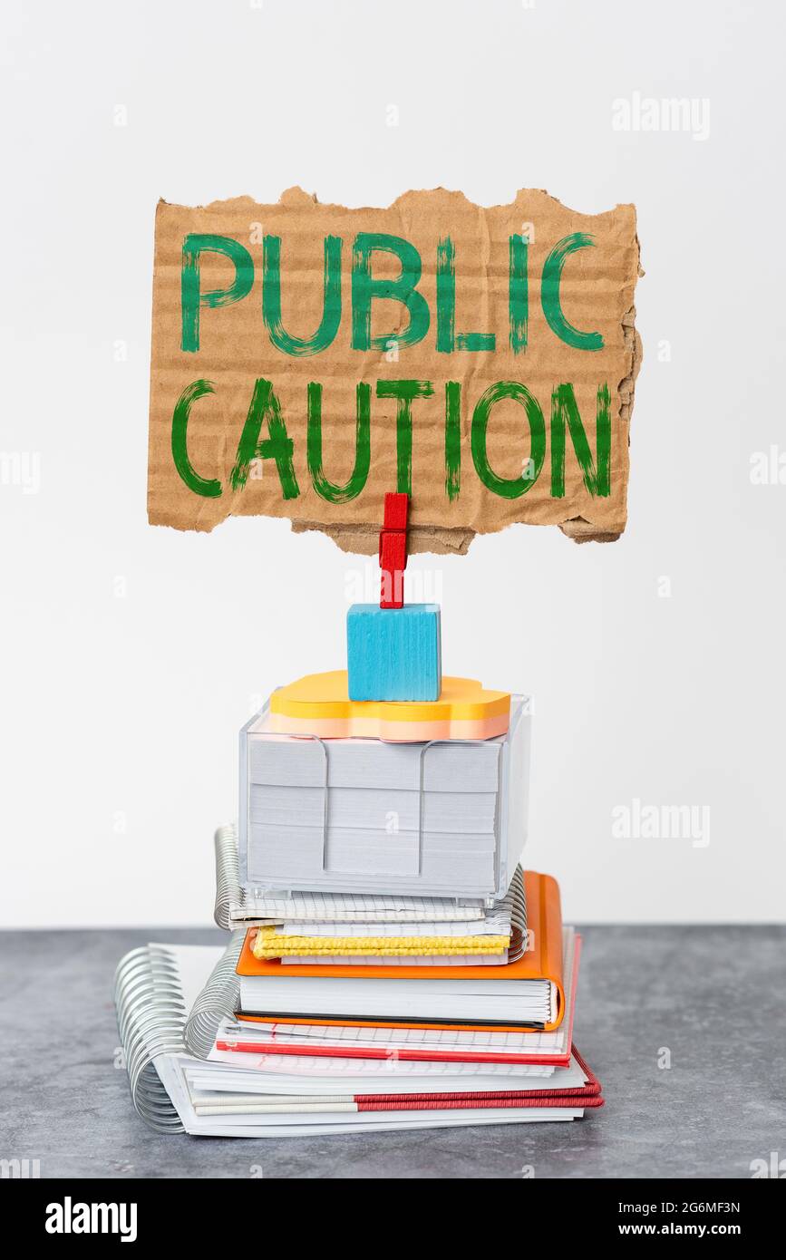 Handwriting text Public Caution. Conceptual photo formal warning given ...