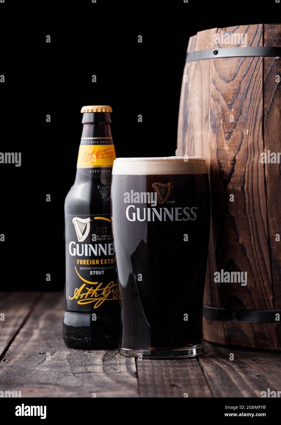 LONDON, UK - APRIL 27, 2018: Bottle and original glass of Guinness ...