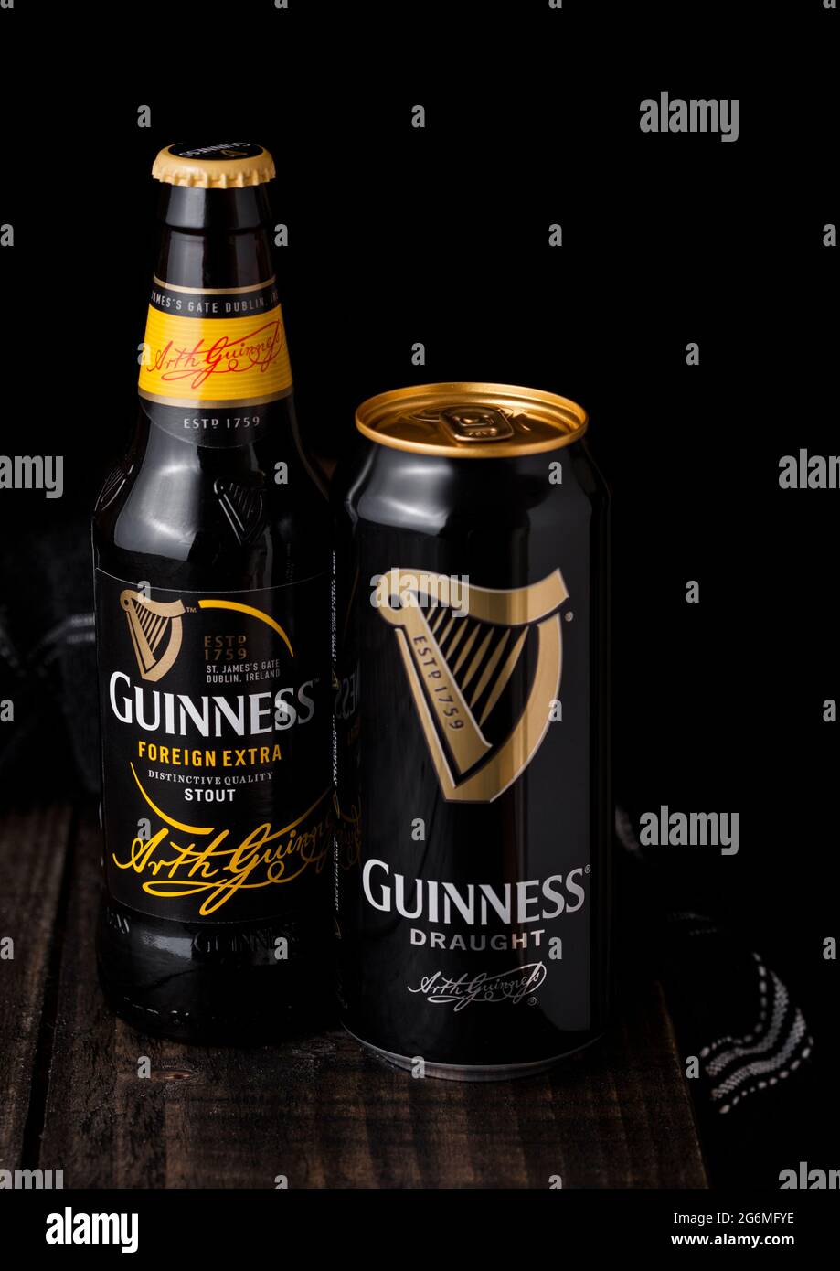 LONDON, UK - APRIL 27, 2018: Bottle and aluminium cans of Guinness ...