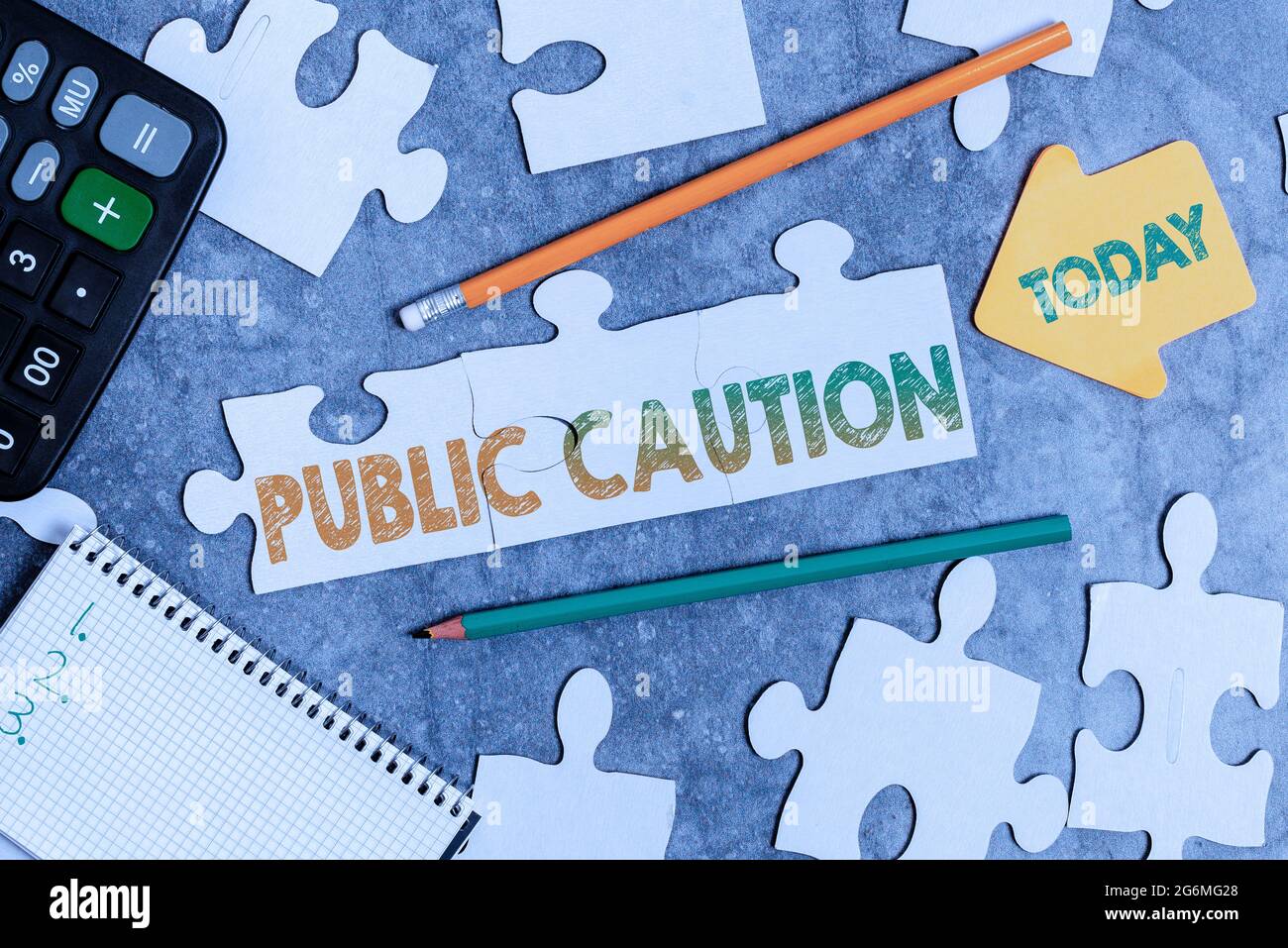 Sign displaying Public Caution. Word for formal warning given to the ...