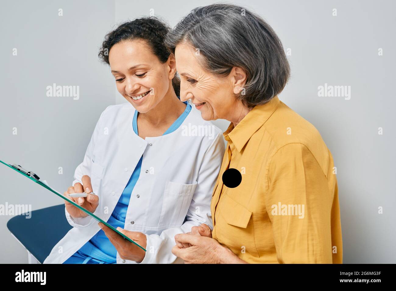 General practitioner consultation for senior patient Stock Photo - Alamy