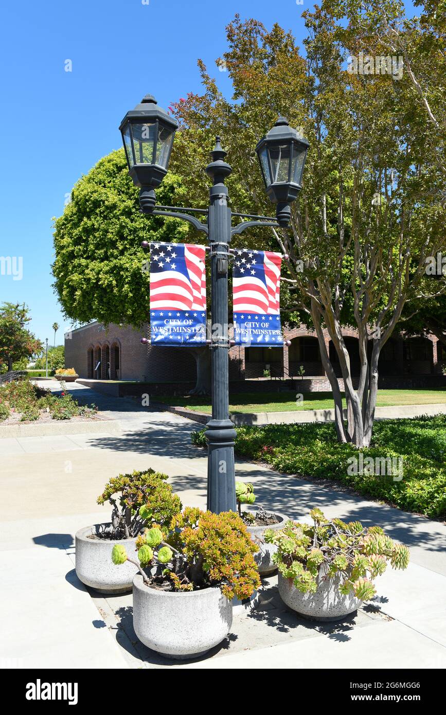 WESTMINSTER, CALIFORNIA - 5 JULY 2021: Lamppost with banners in Civic ...