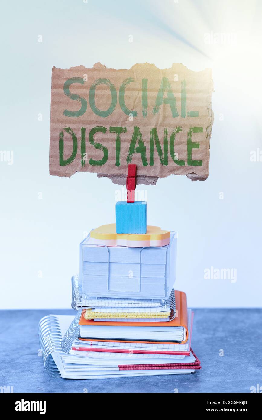 Hand writing sign Social Distance. Business concept maintaining a high ...