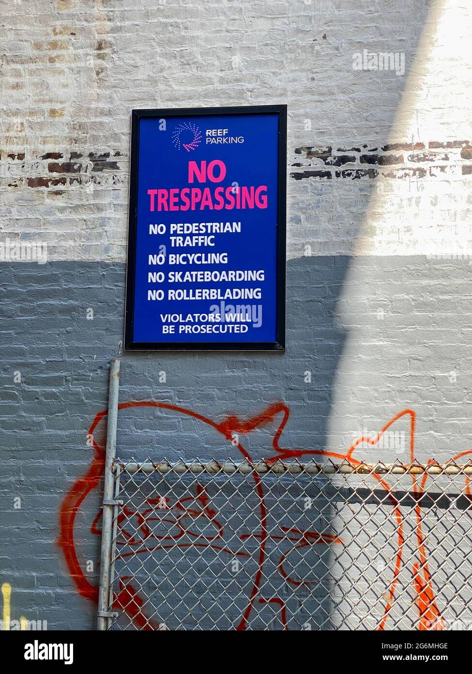 New York, NY, USA - July 6, 2021: Warning sign in alley used for ...