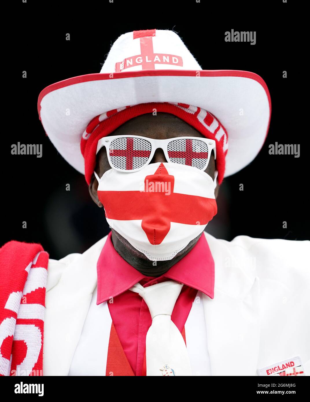 An England fan outside Wembley Stadium ahead of the UEFA Euro 2020 semi ...
