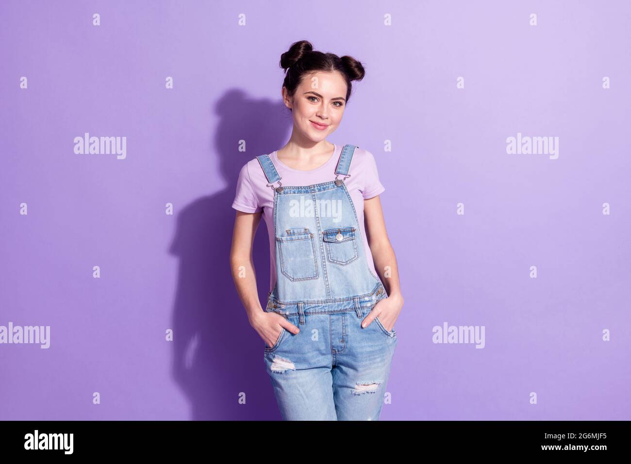 Photo of sweet positive brown hair lady wear t-shirt overall isolated ...