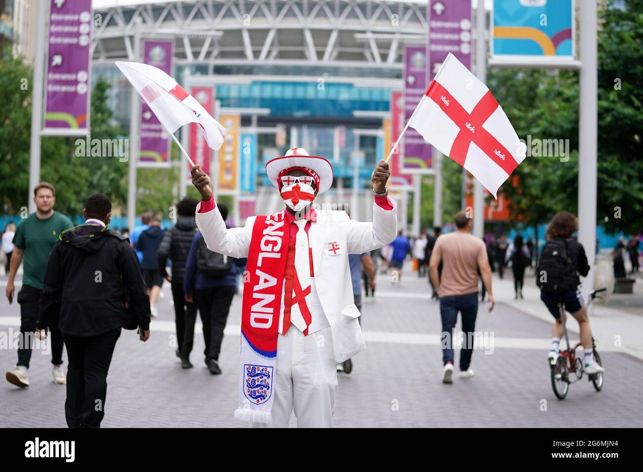 An England fan outside Wembley Stadium ahead of the UEFA Euro 2020 semi ...