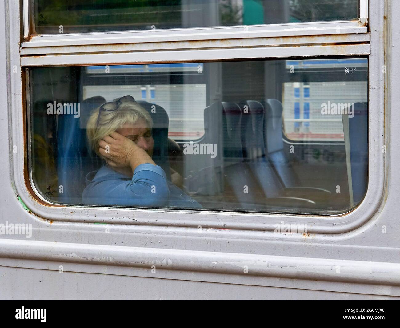 A Woman Falls Asleep On A Train Photo By Mihail Siergiejevicz Sopa