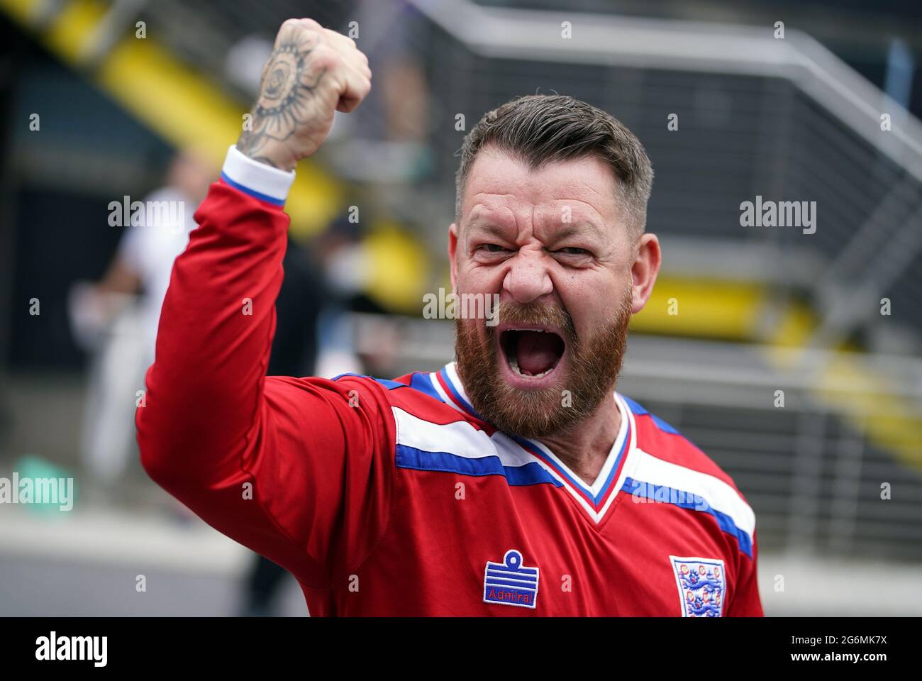 An England fan outside Wembley Stadium ahead of the UEFA Euro 2020 semi ...