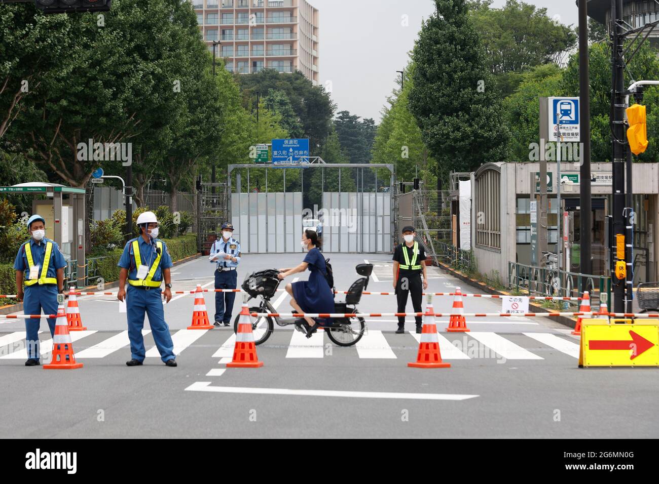 Tokyo, Japan. 7th July, 2021. Security guards monitor the access to the ...