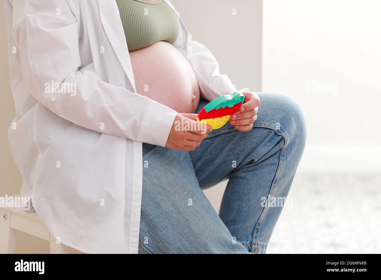 pregnant woman with big belly advanced pregnancy is using anti stress ...