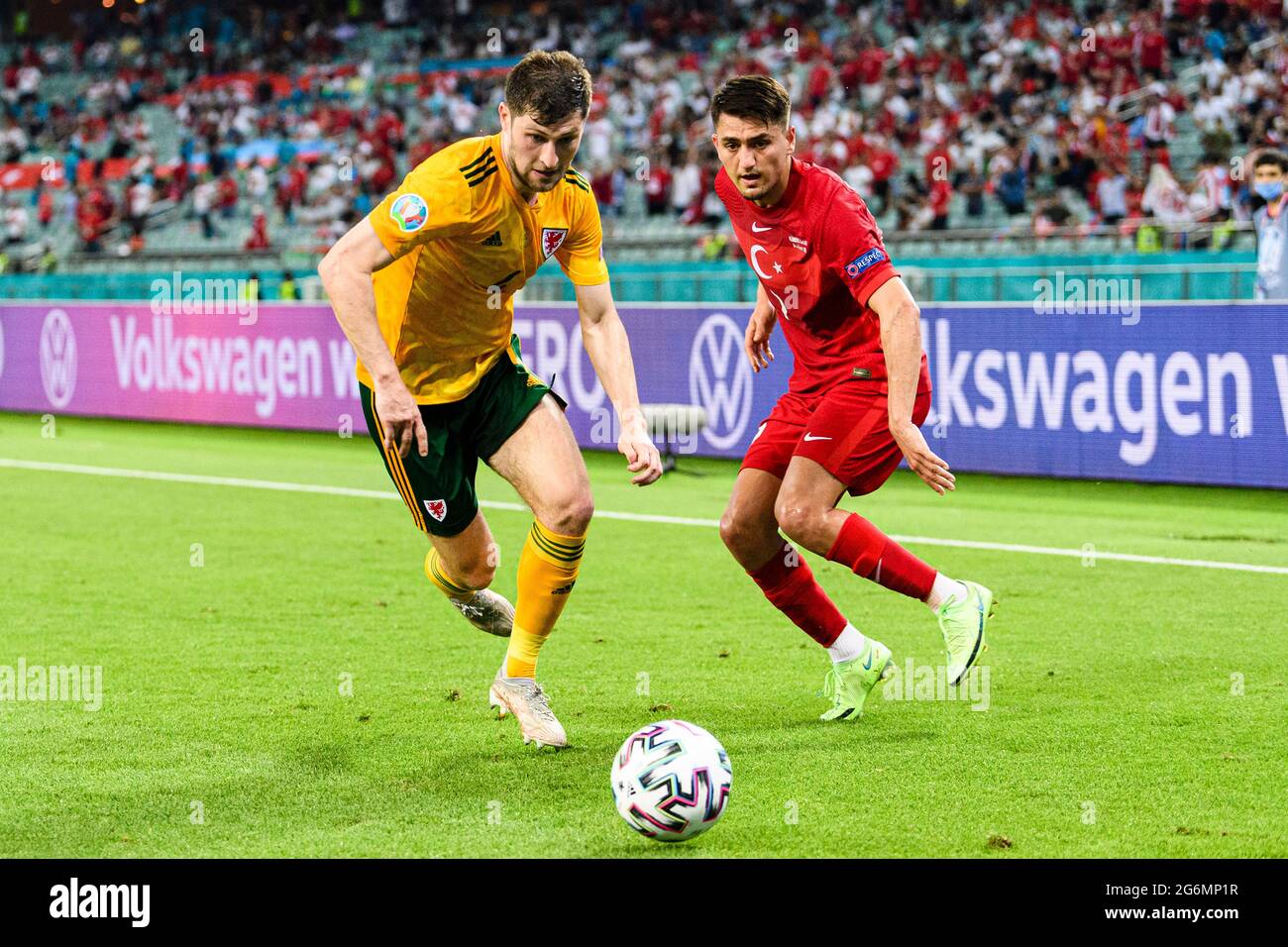 Baku, Azerbaijan. 16th Jun, 2021. Christopher Gunter of Wales (L)plays ...