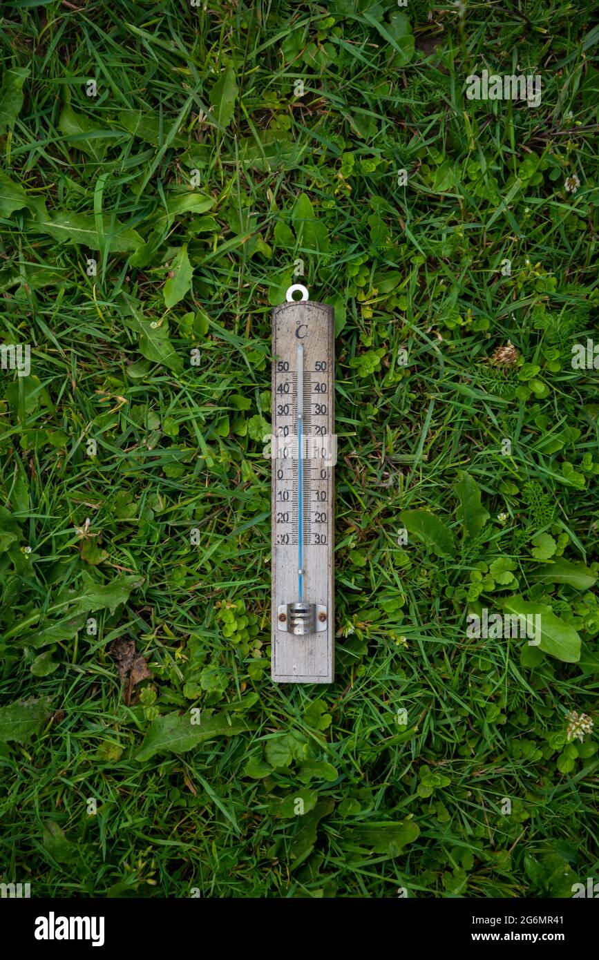 thermometer on grass top view copy space Stock Photo - Alamy