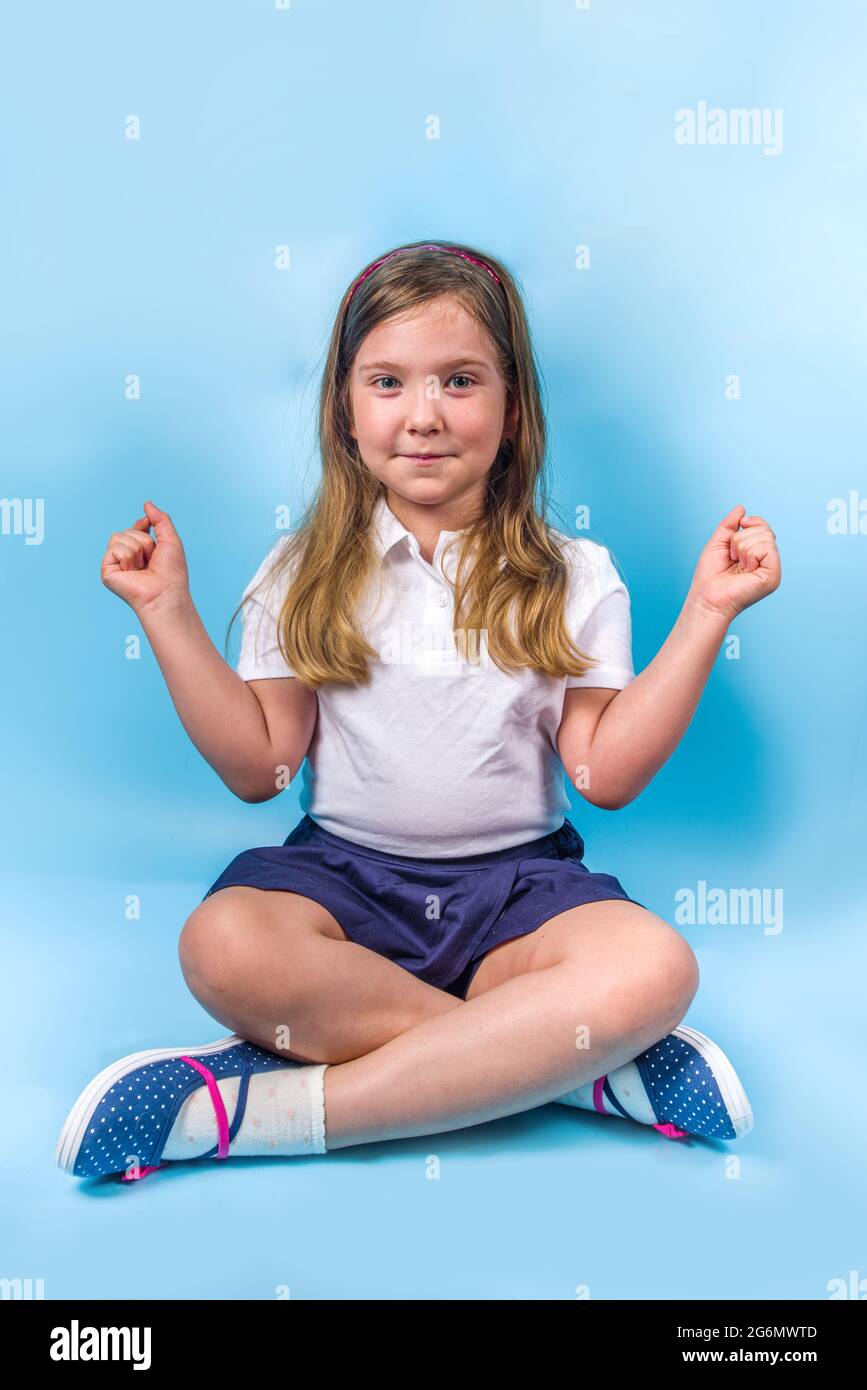 Back to school Life balance concept. Cute Caucasian blond girl, with ...