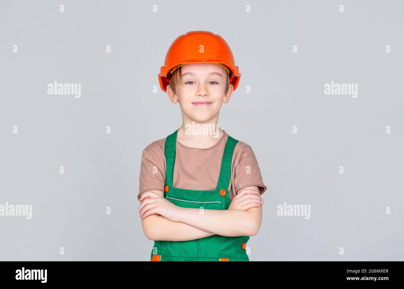 Portrait little builder in hardhats. Child building helmet, hard hat ...