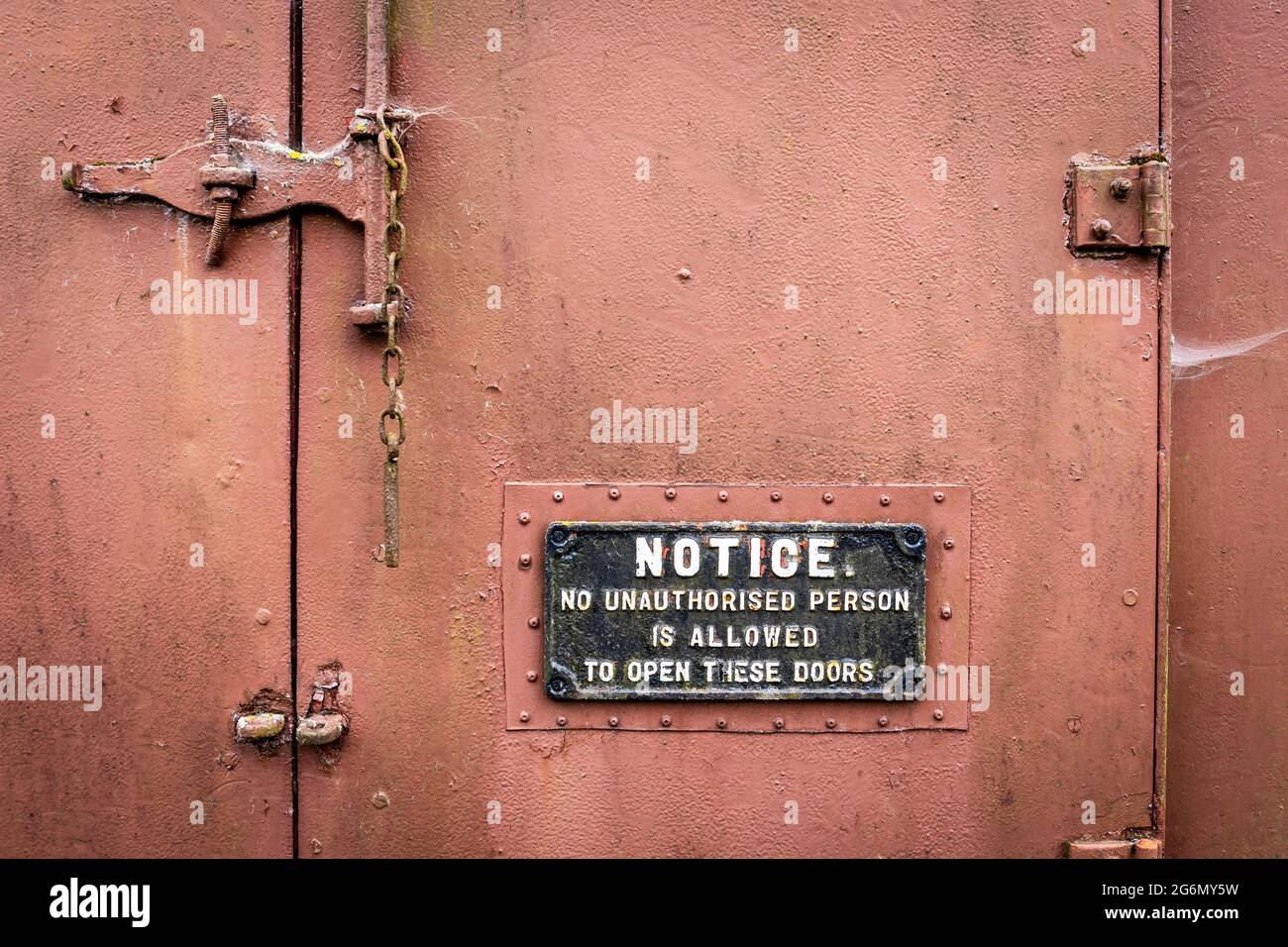 Probation sign preventing access on the doorway into an old railway ...