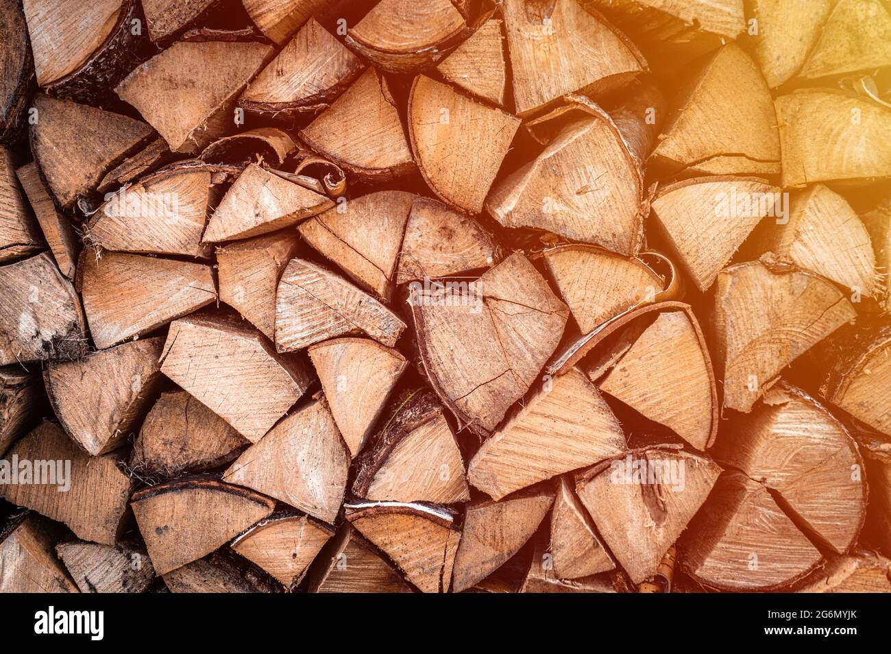 textured firewood background of chopped wood for kindling and heating ...