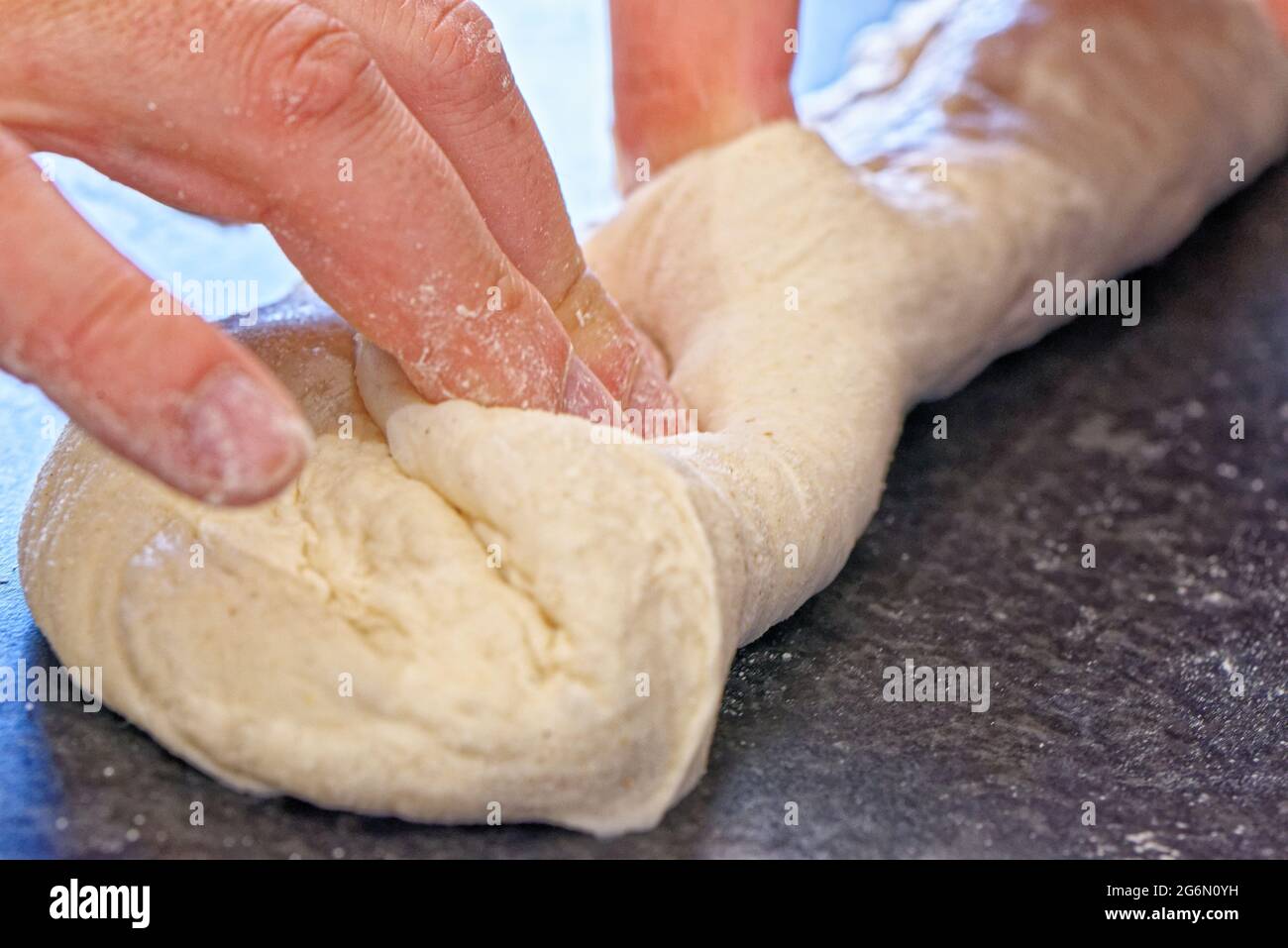 Bread making: in a kitchen the chef sets about making traditional ...