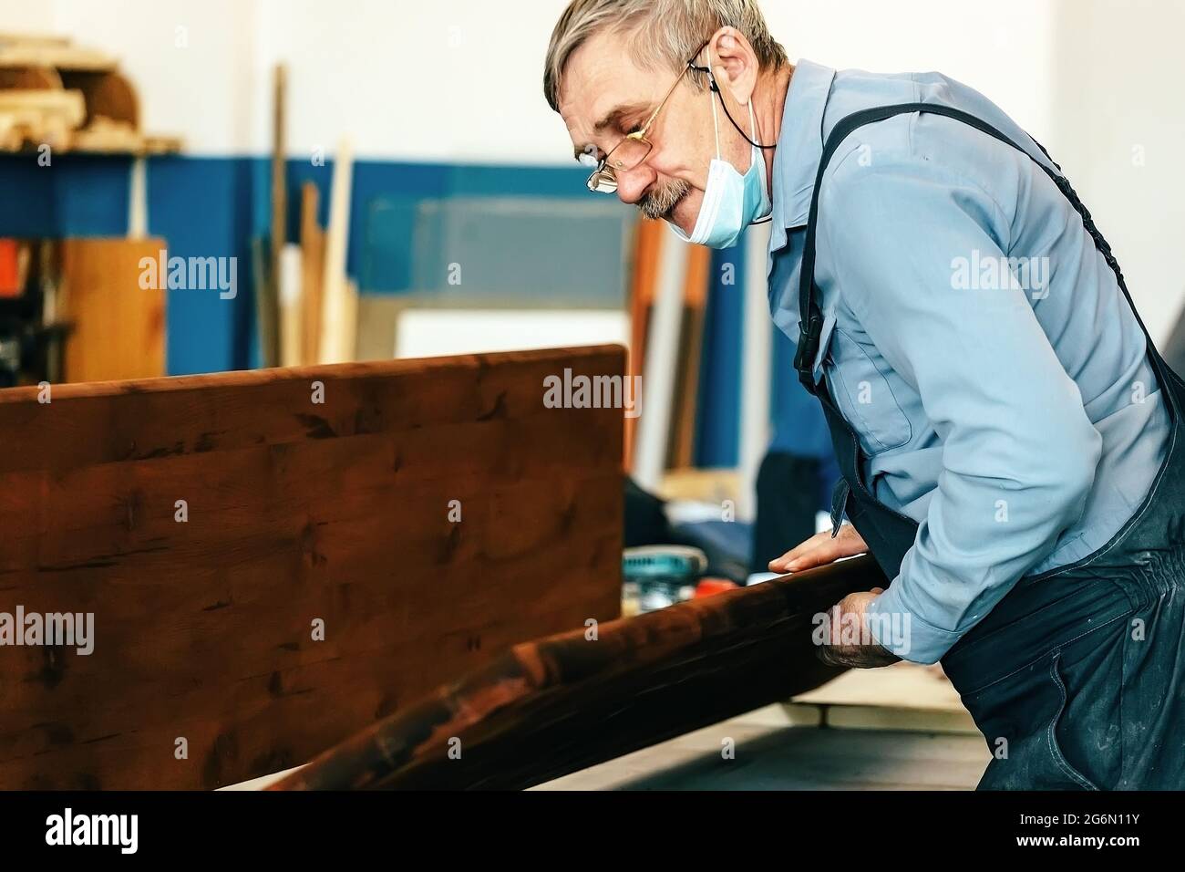 Man at work clothes shop hi-res stock photography and images - Alamy