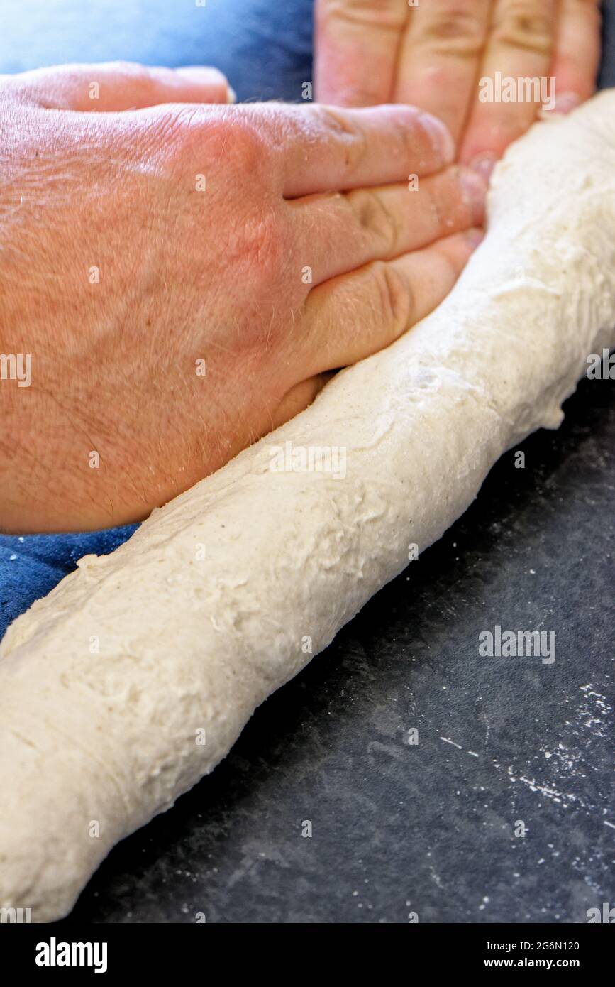 Bread making: in a kitchen the chef sets about making traditional ...