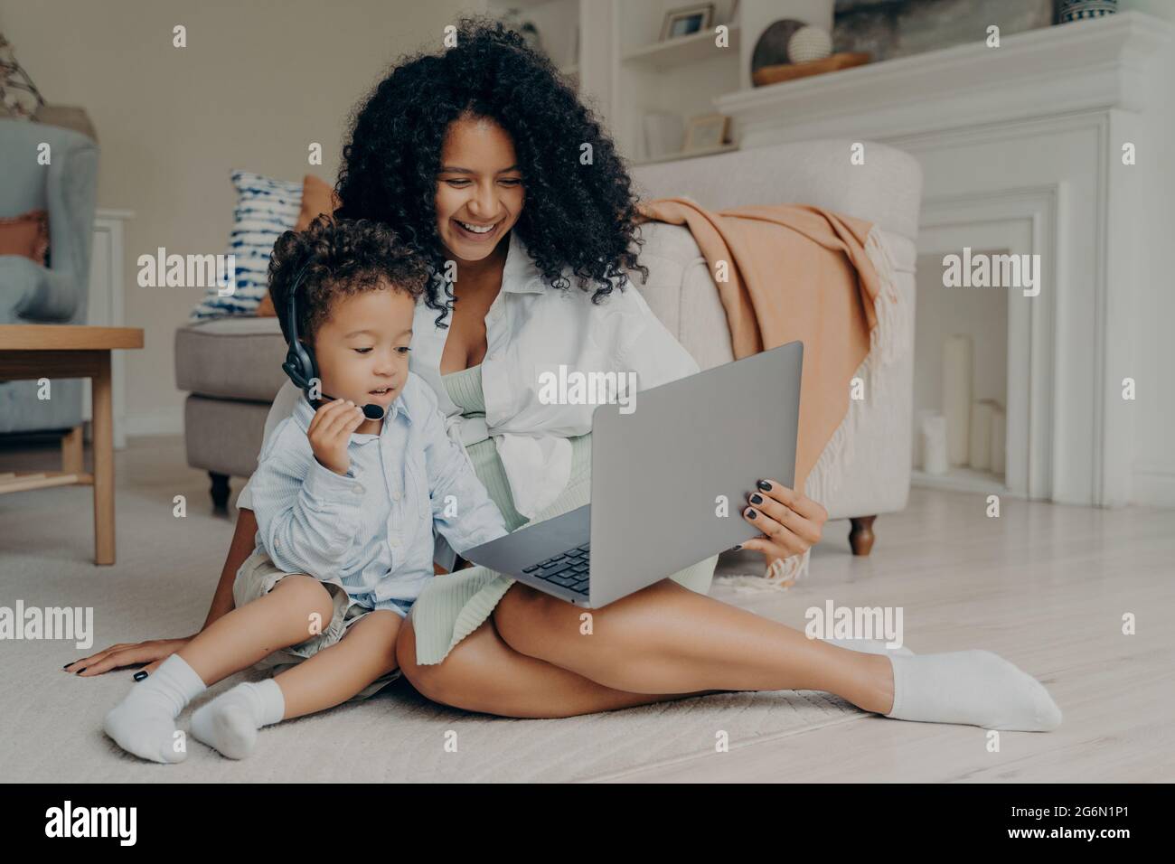 Happy african mom and baby son enjoying video call with family Stock ...