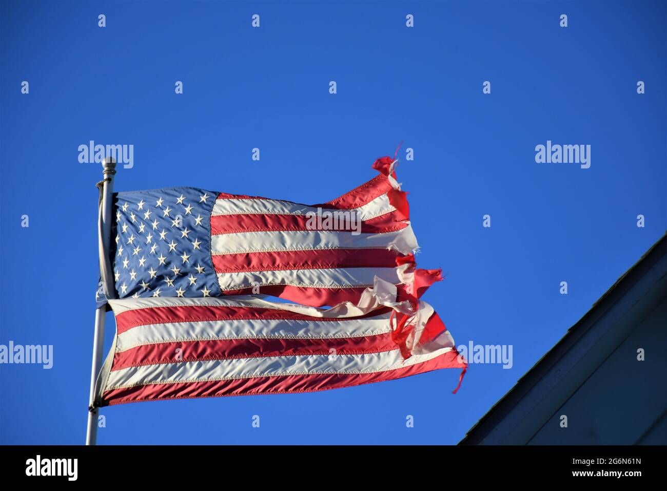 The wind has destroyed this American flag and needs to be replaced ...