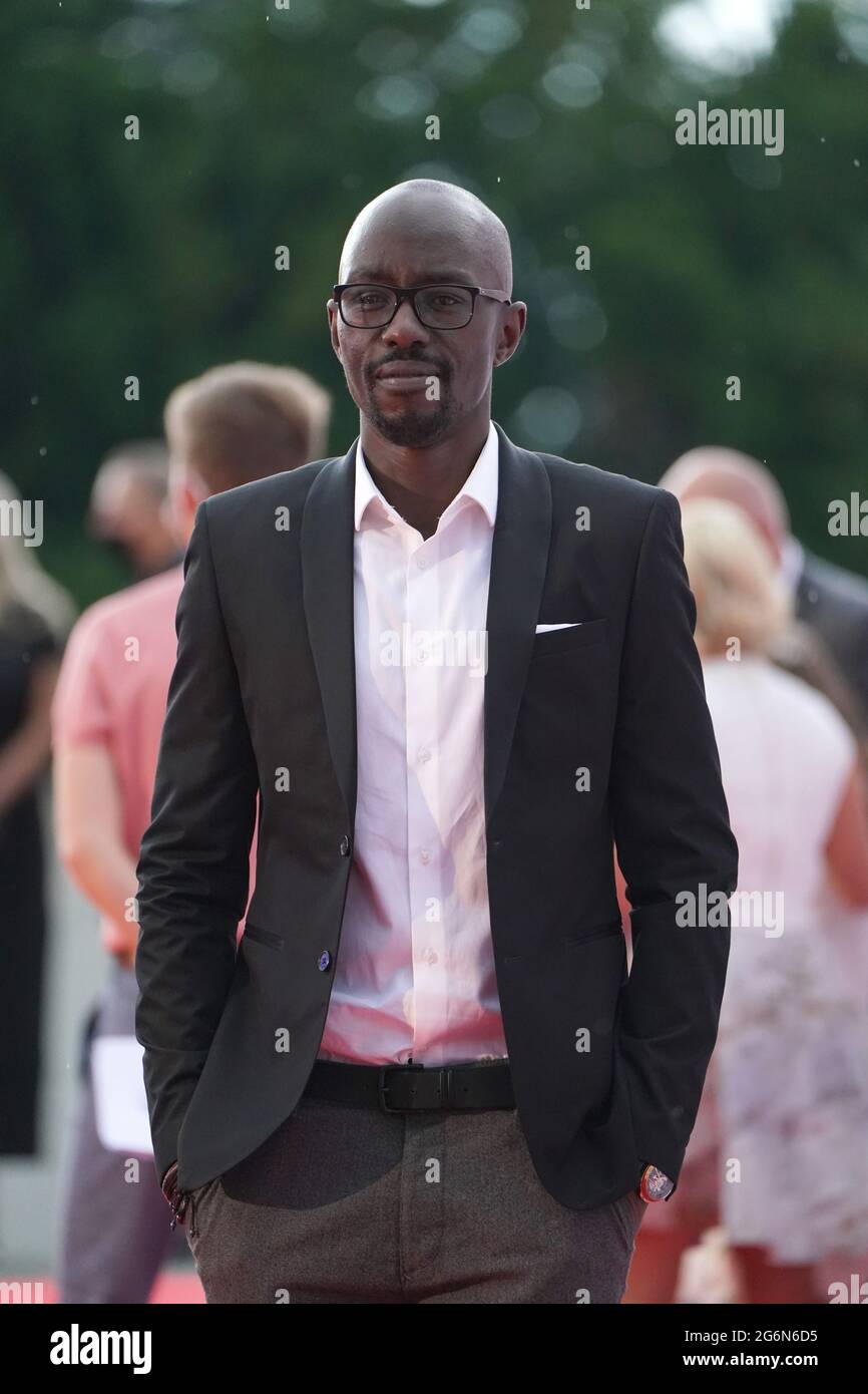 Director Stewart Kyasimire arrives for the Pride of Scotland awards at ...