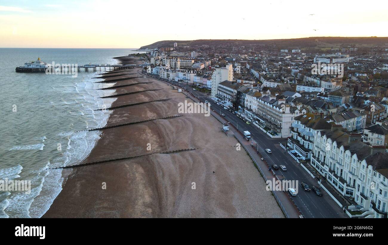 Eastbourne Pier UK and seafront at sunset 2021 aerial image Stock Photo ...