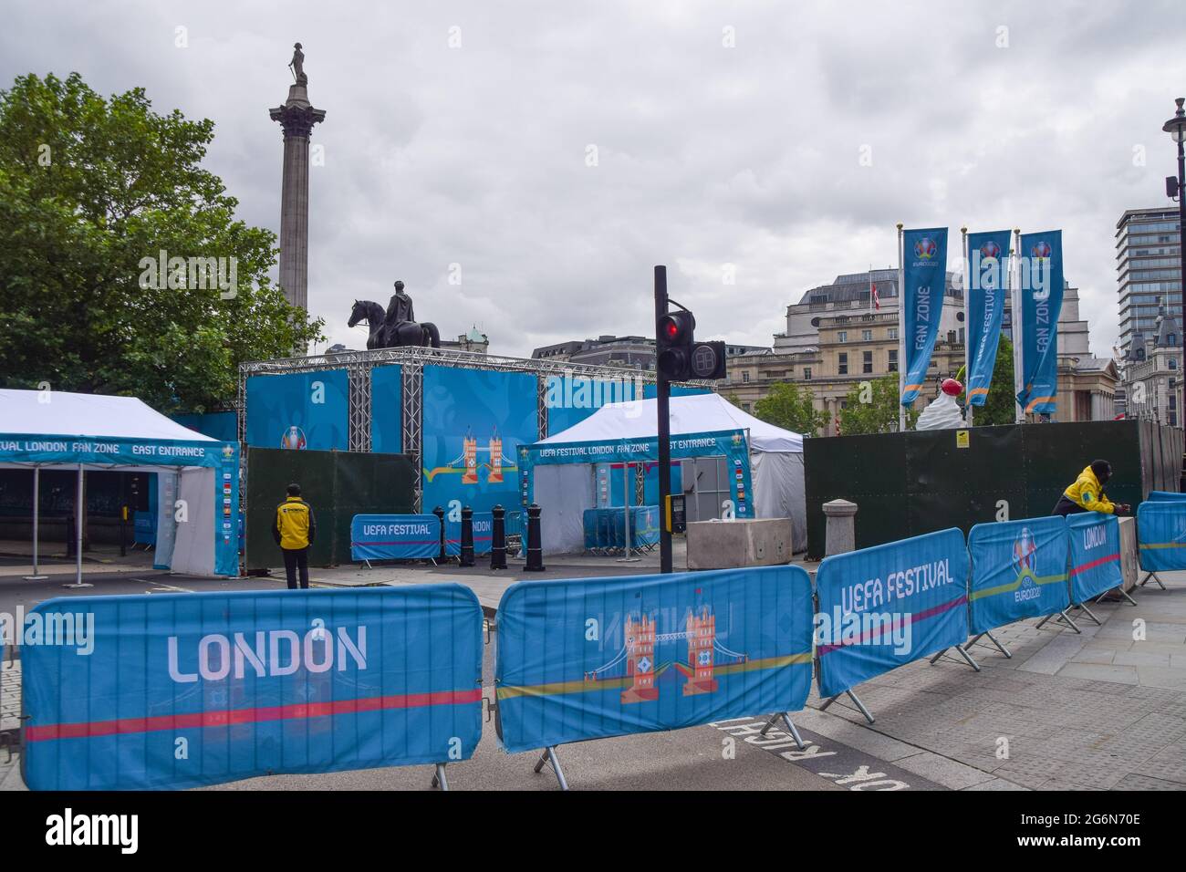 Barriers block the streets around Trafalgar Square for the Fan Zone ...