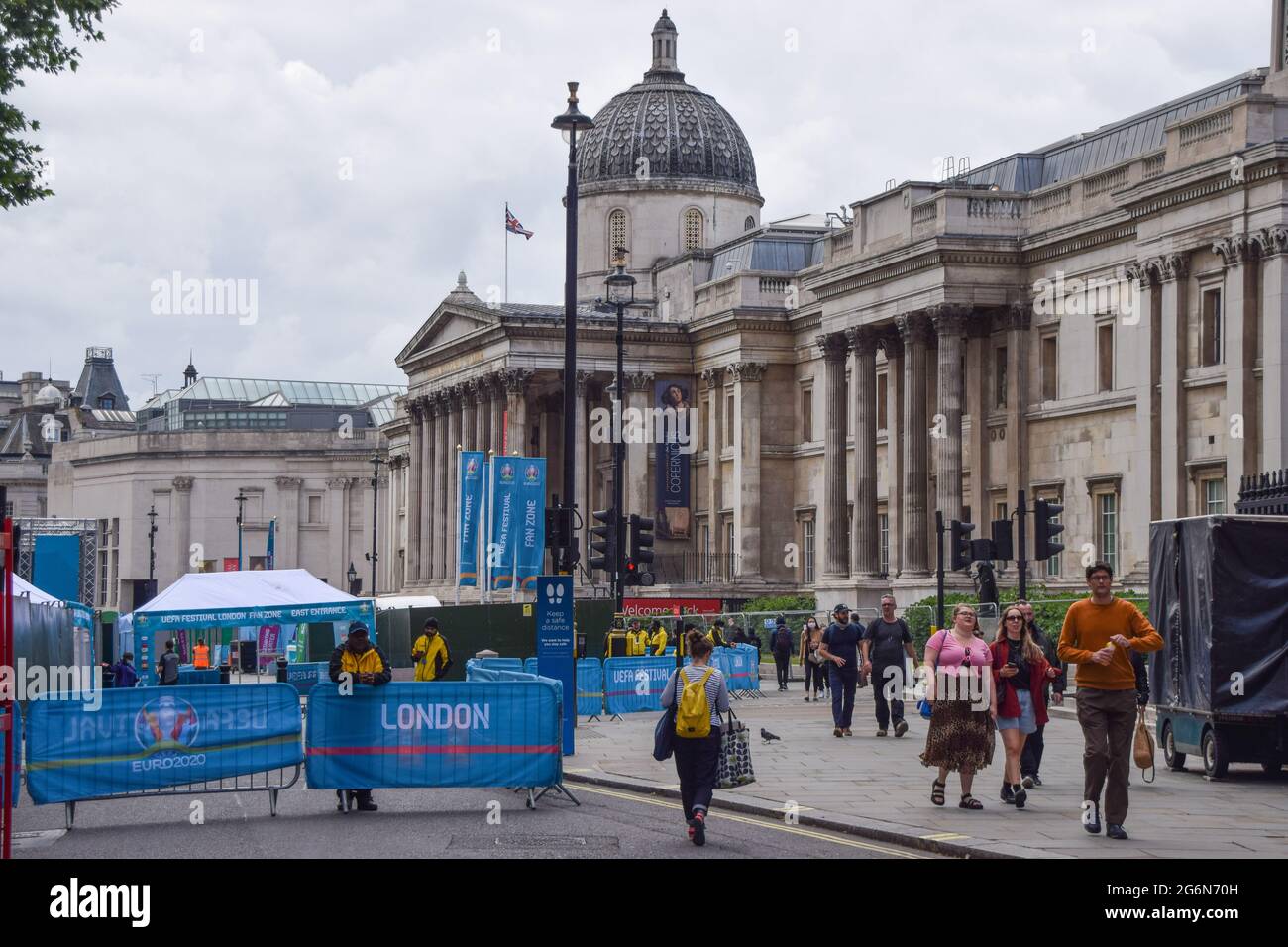 Barriers block the streets around Trafalgar Square for the Fan Zone ...