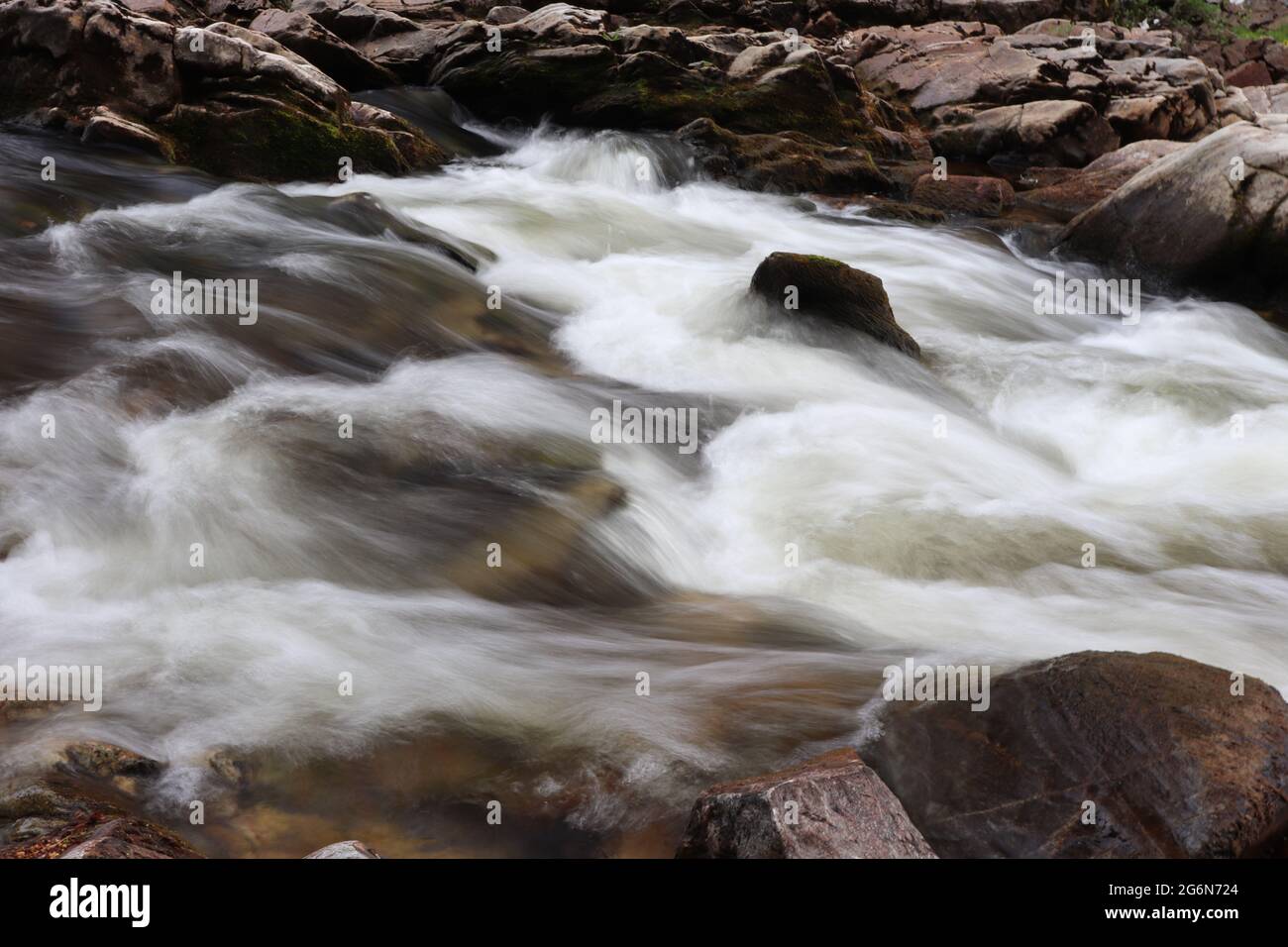 Intentional motion blur in mountain river Stock Photo - Alamy