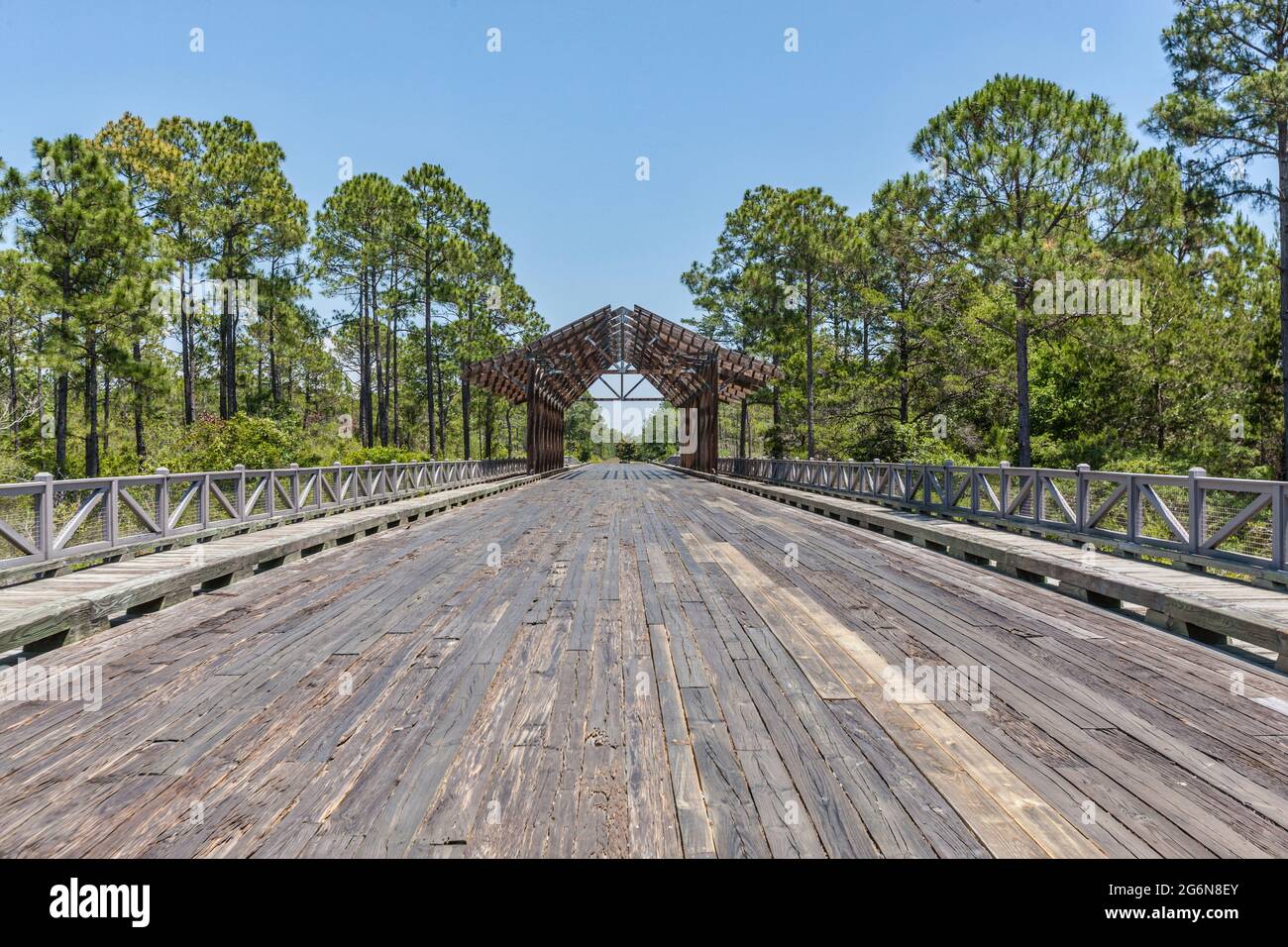 A wooden bridge crosses a ravine Stock Photo - Alamy