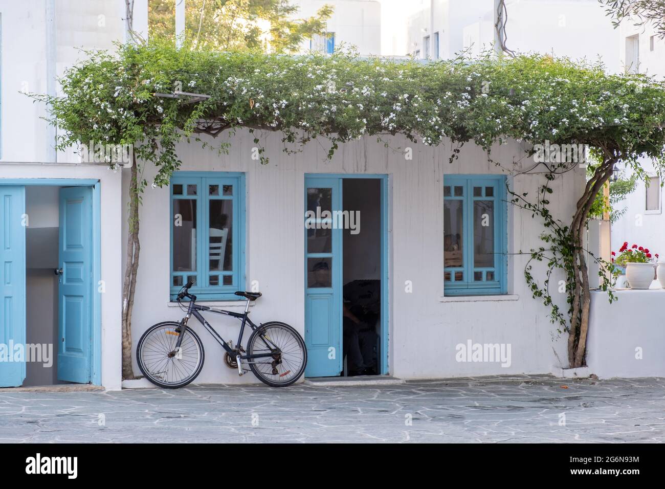 Greece, Cyclades. Traditional building white wall, blue color windows ...