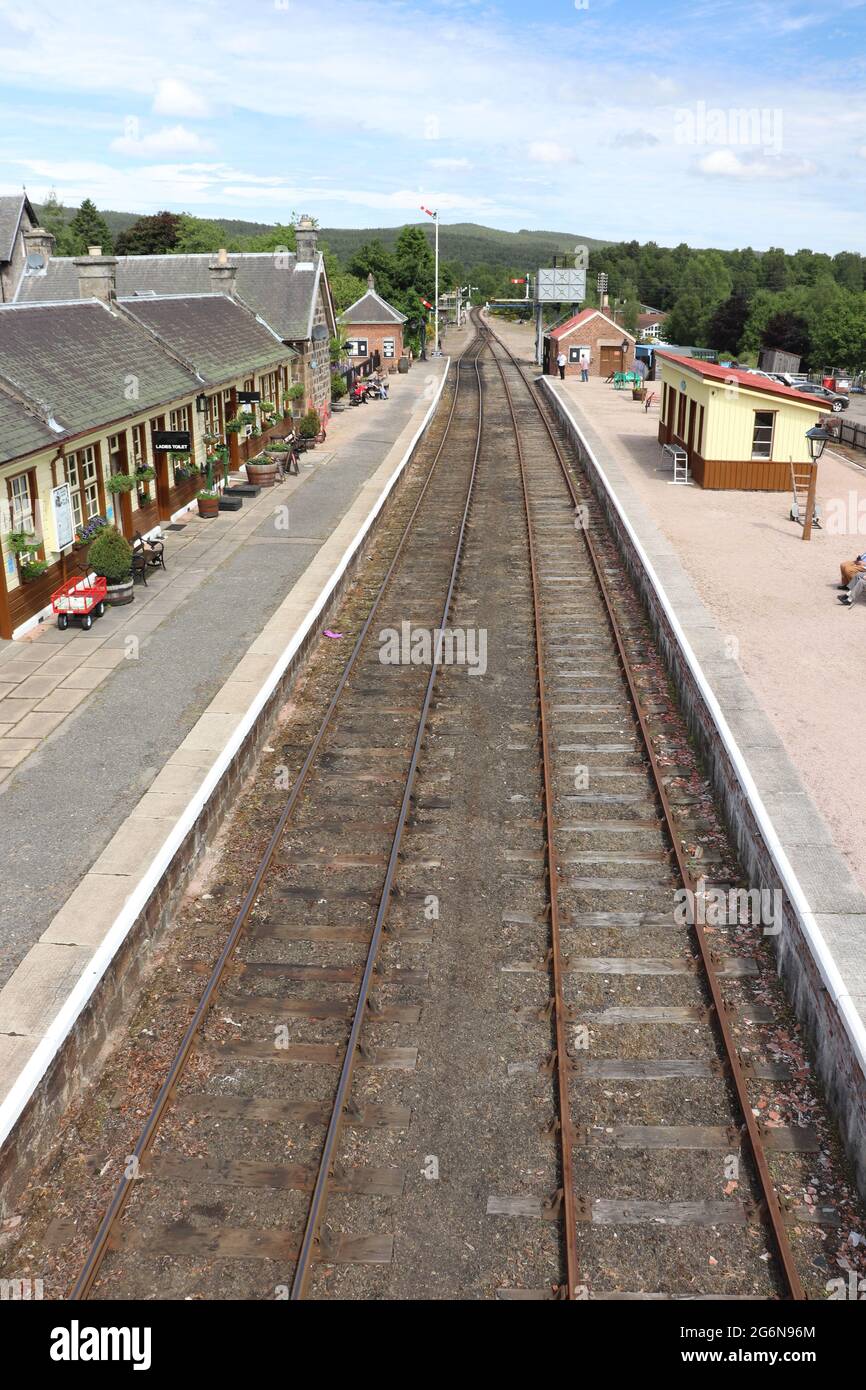 Old steam train arriving in station Stock Photo - Alamy
